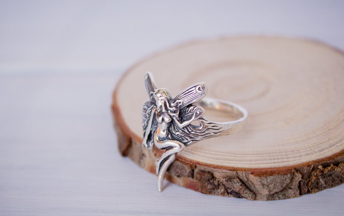 Beautiful sterling silver ring with faerie fairy design | Etsy
