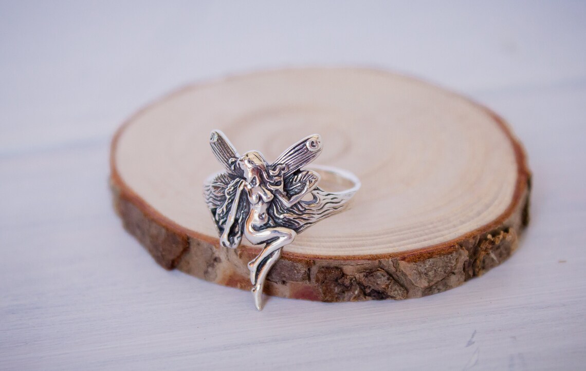Beautiful sterling silver ring with faerie fairy design | Etsy