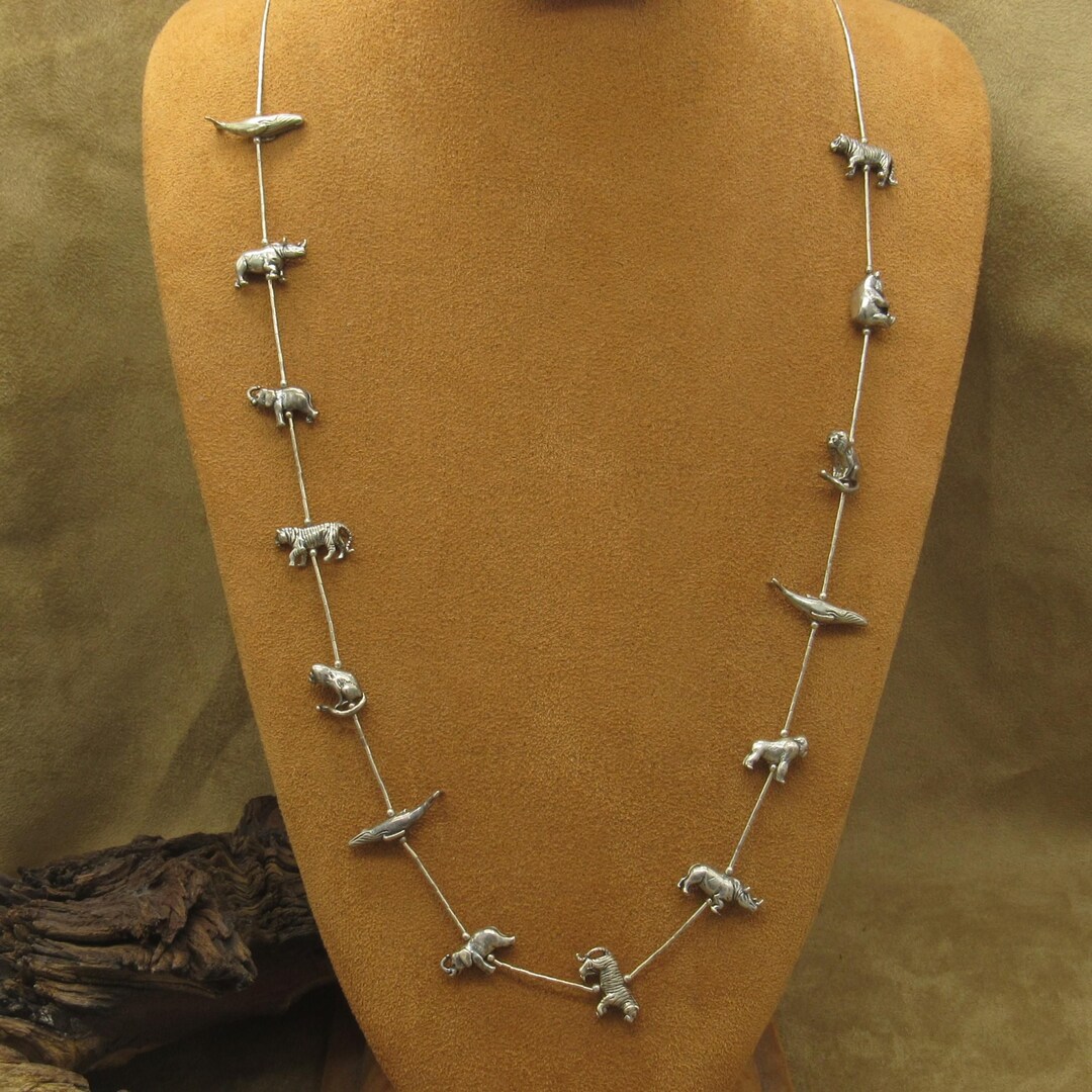 Sterling Silver Animals and Liquid Silver Necklace - Etsy