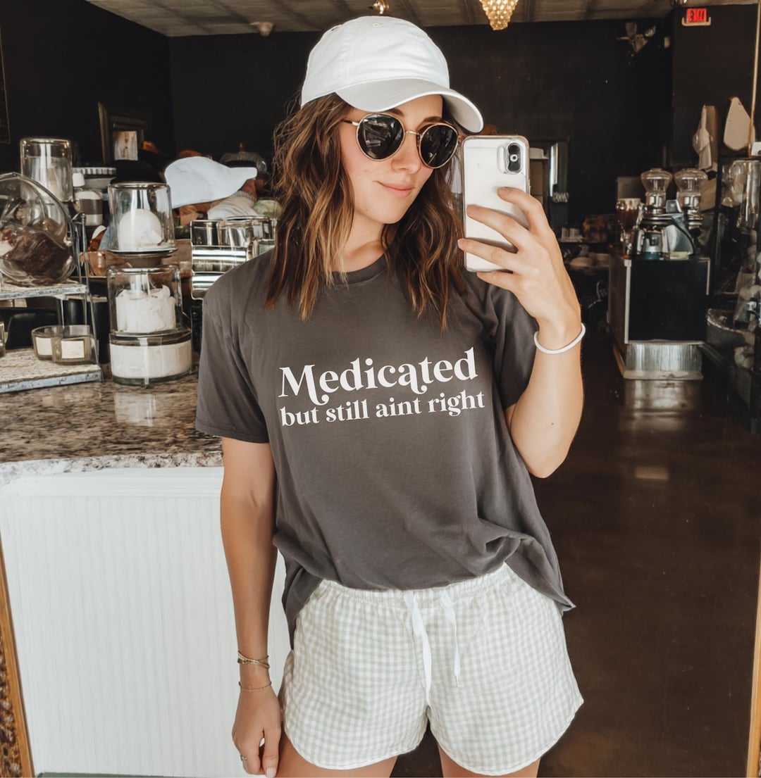 Funny Mental Health Tee: Medicated but Still Ain't Right - Etsy