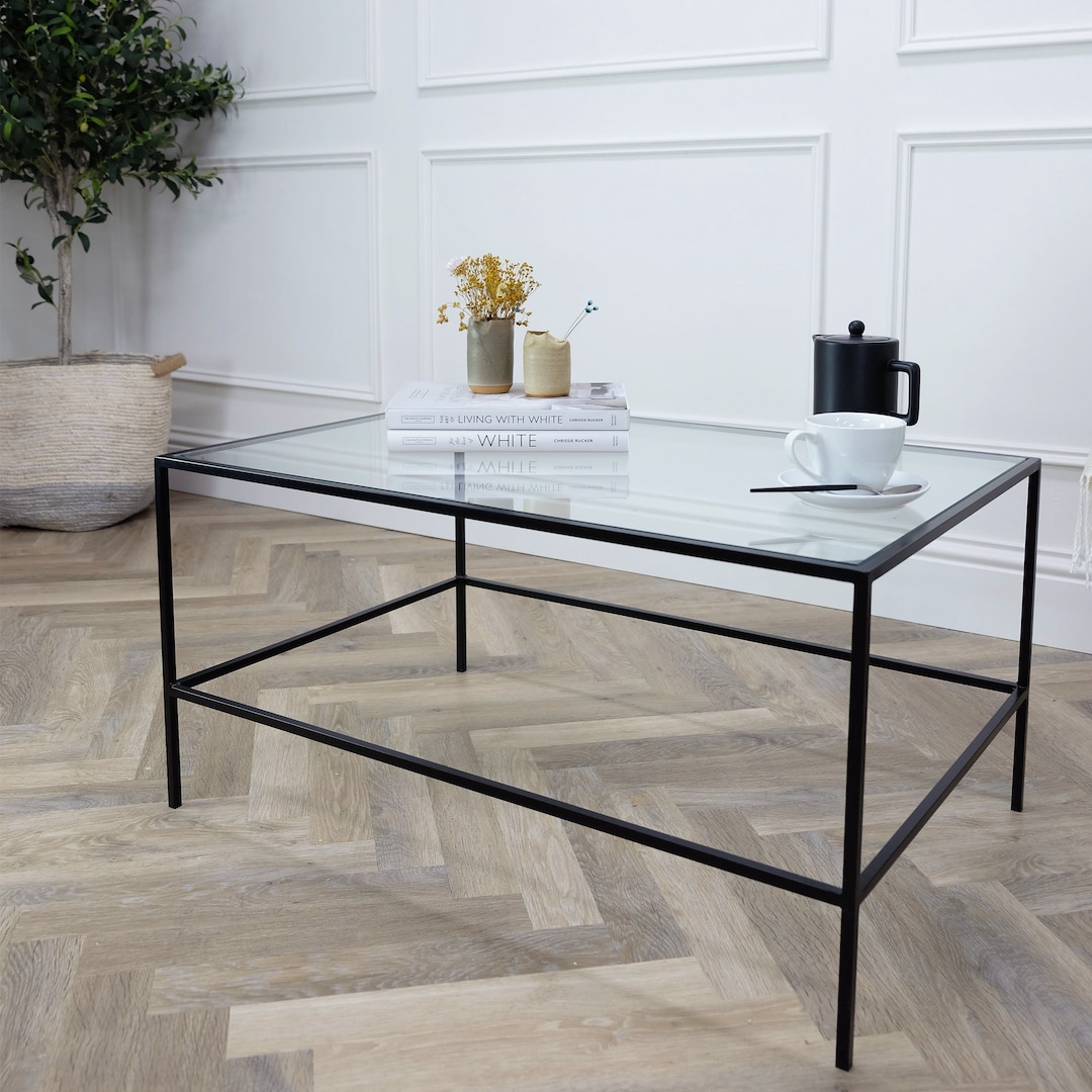 Glass and black metal coffee table store