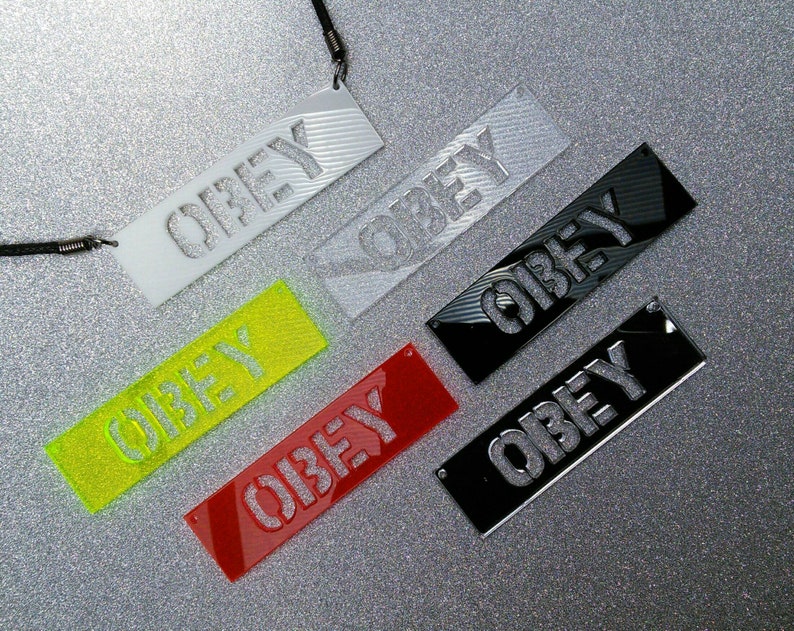 Acrylic OBEY stamp effect cut out letters necklace. | Etsy