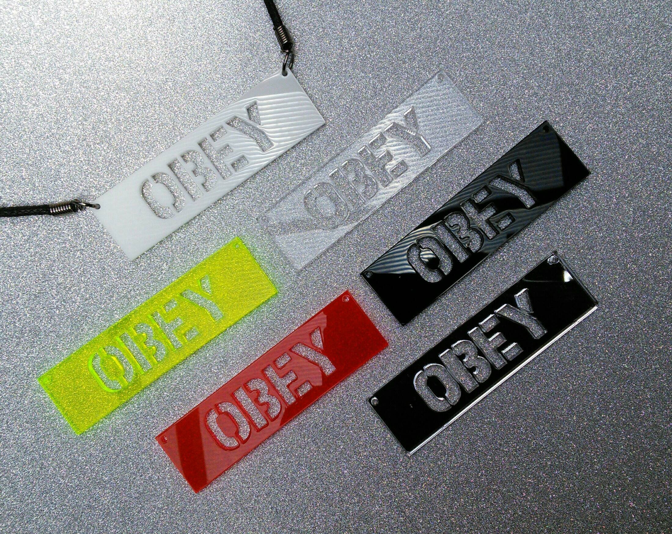 Acrylic OBEY stamp effect cut out letters necklace. | Etsy