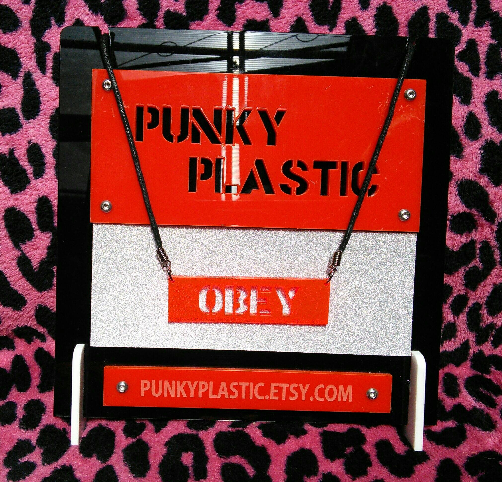 Acrylic OBEY stamp effect cut out letters necklace. | Etsy