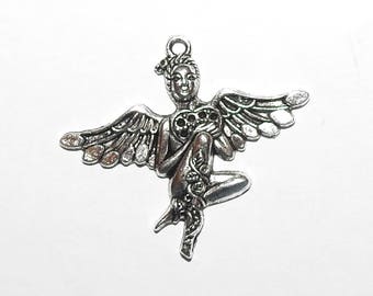 Angel holding heart | Etsy