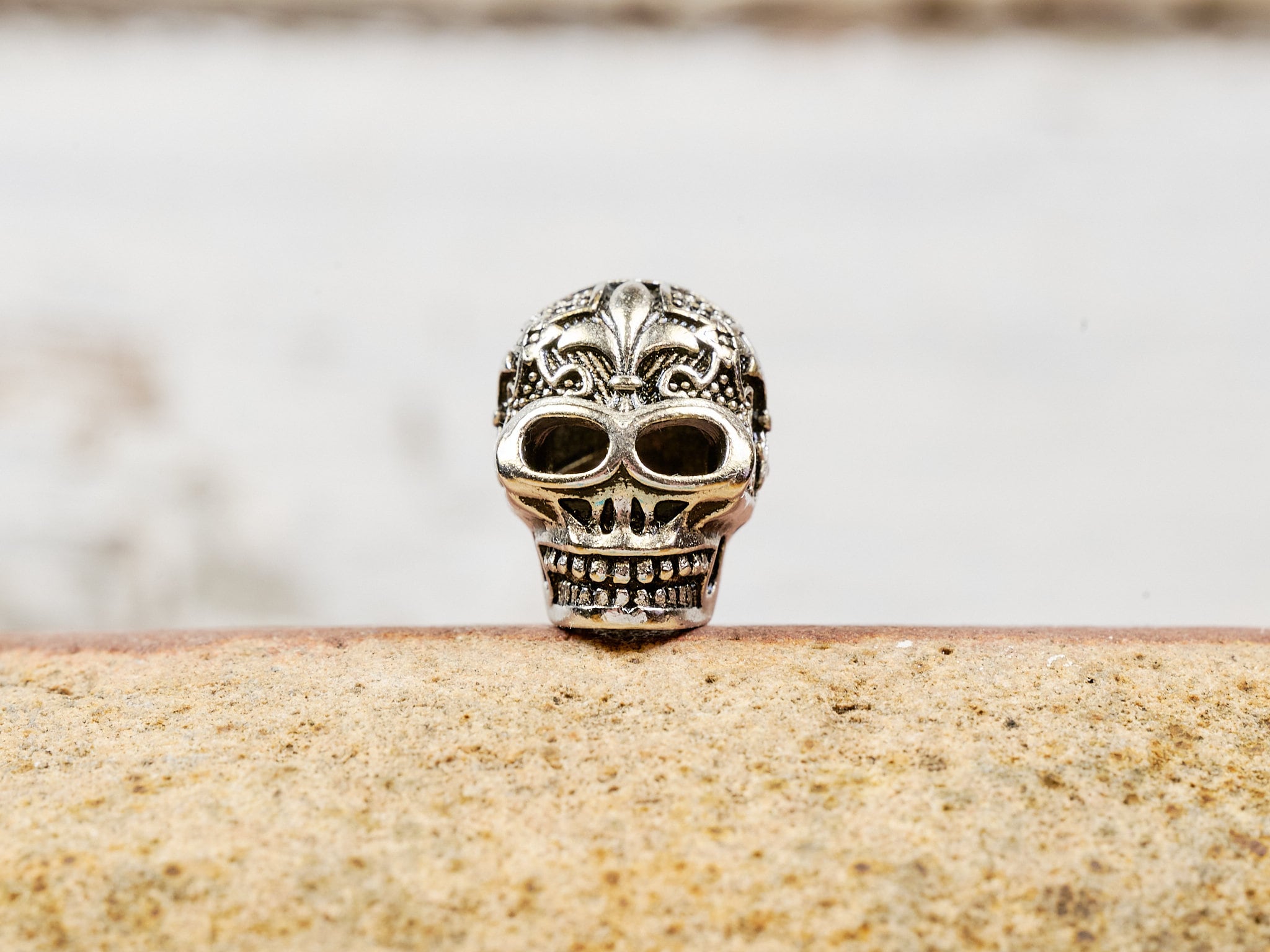 Silver skull beads store