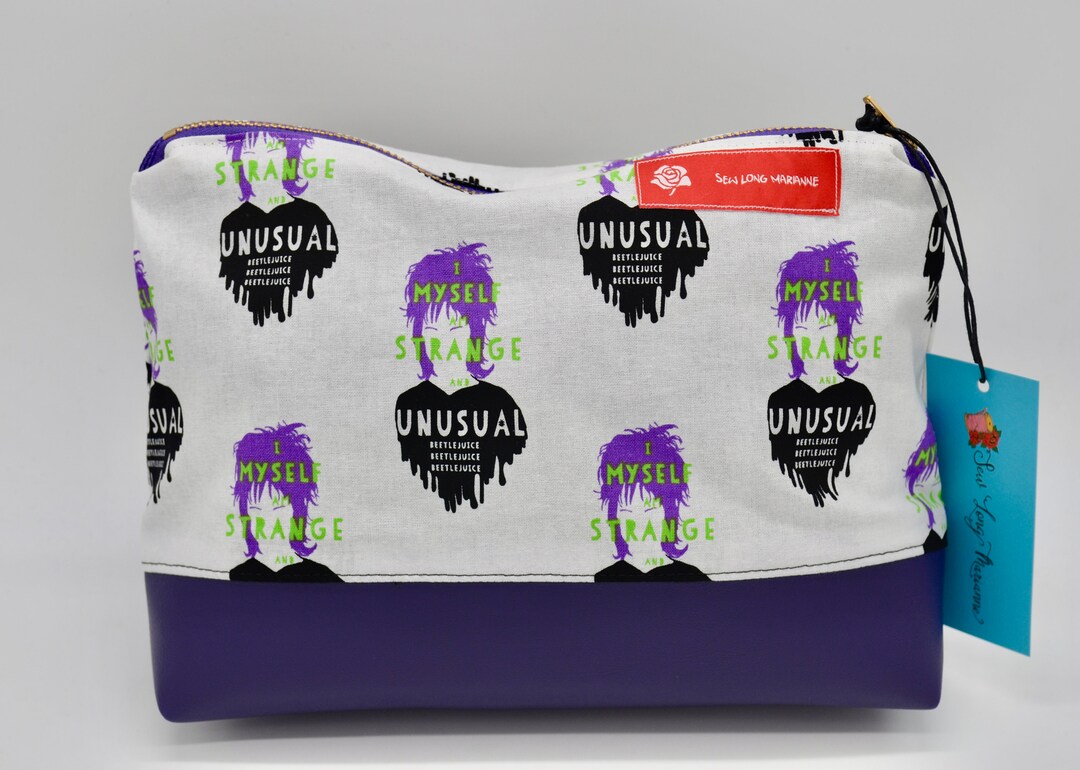 Beetlejuice Lydia Deets Strange and Unusual Zipper Pouch - Large Purple ...