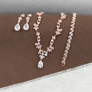 MeisBoutique Rose Gold Wedding Jewelry Set for Brides Boho Rose Gold Bridal Jewelry Set Chunky Necklace Teardrop Earrings Crystal Bridal Jewelry Set