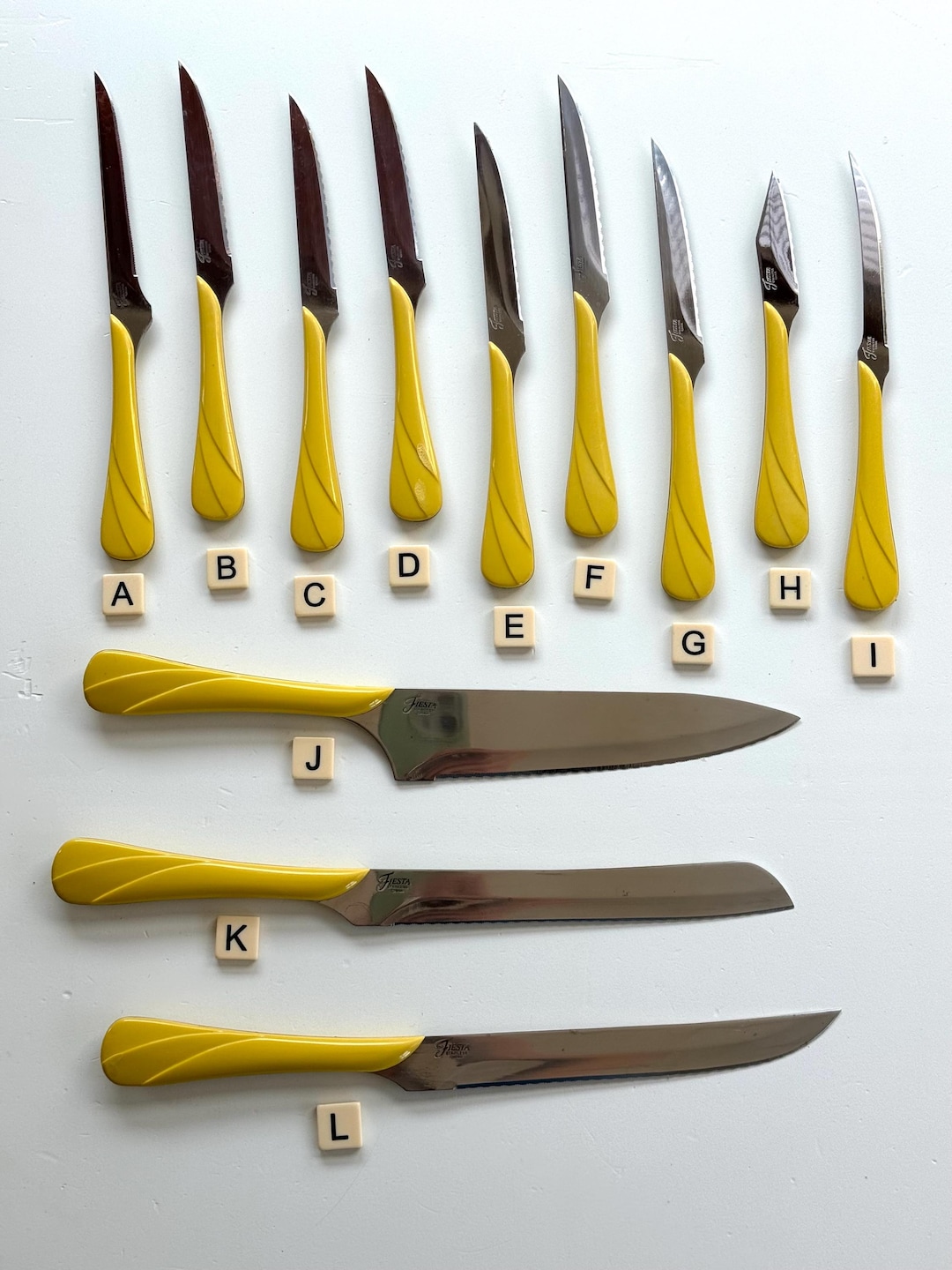 Homer Laughlin Fiesta Yellow Stainless and Melmac Swirl Handle Knives ...