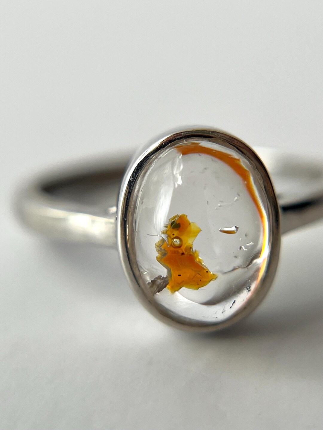Golden Enhydro Quartz Teardrop Ring With Clear Moving Bubble and Black ...