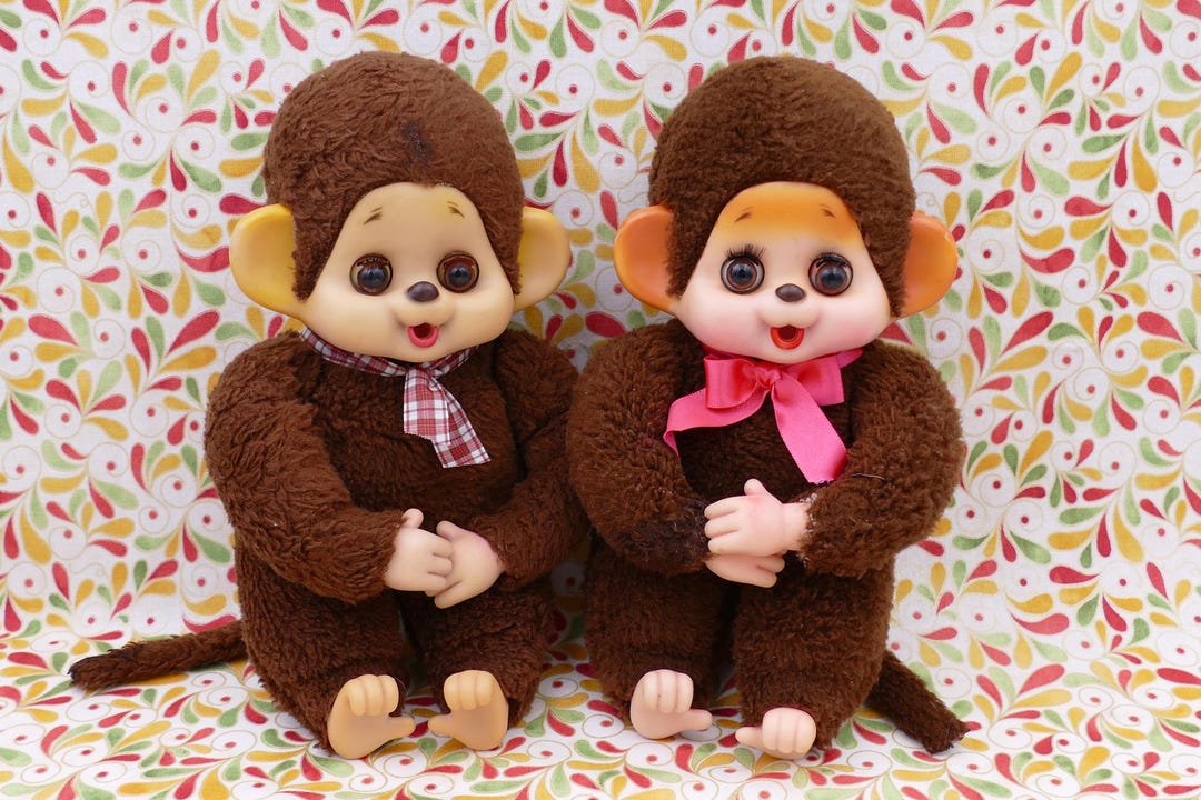 Pair of 1970's Spring-arm Hugging Thumb-sucking Rattle Monchhichi Dolls ...