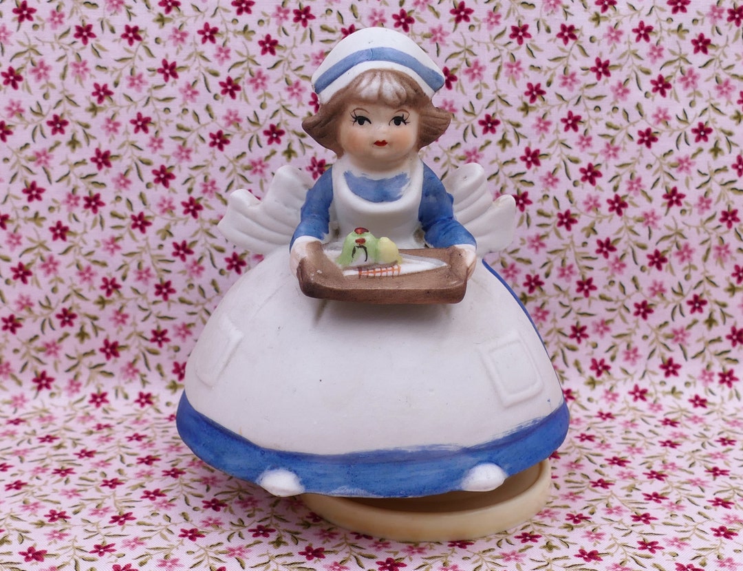 Vintage 1979 Unglazed Ceramic Rotating Nurse Figurine Music Box ...