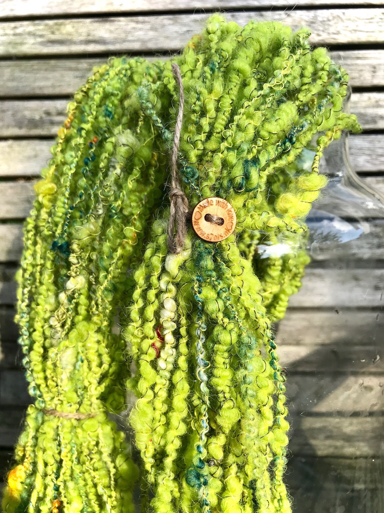 Hand spun art yarn in vibrant greens. A real eye cartcher made with ...