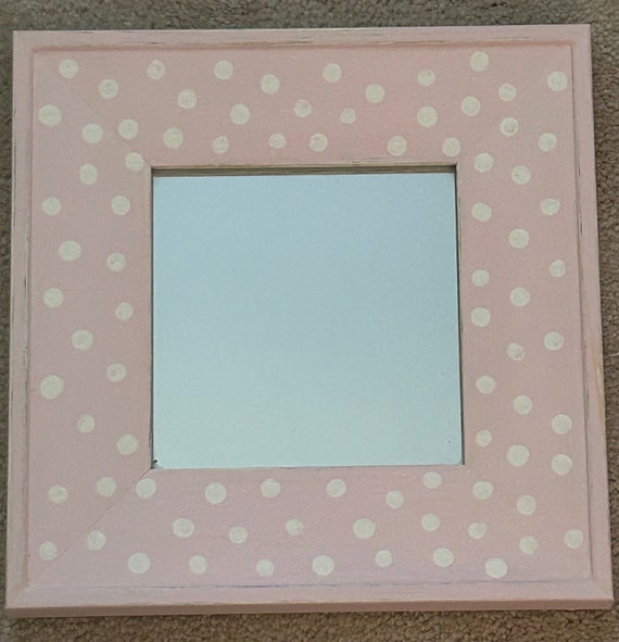 Polka dot mirror store