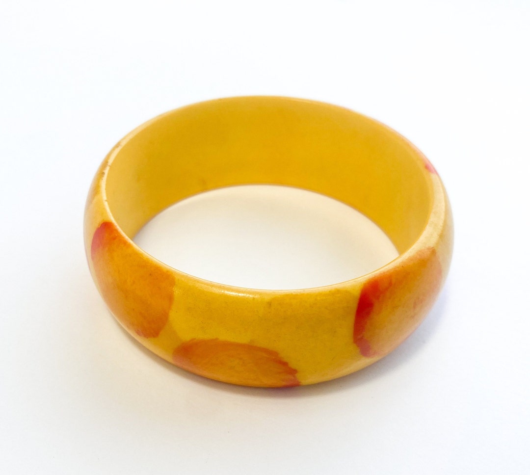 1930s Butterscotch Bakelite Bangle | 30s Yellow Polka Dot Bakelite Bangle | Orange Spotted ...