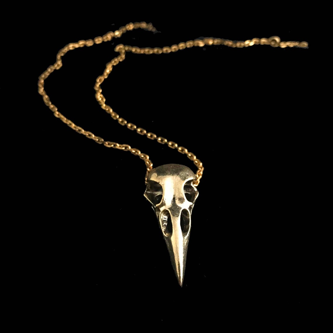 Small crow skull necklace//gold plated solid bird skull | Etsy