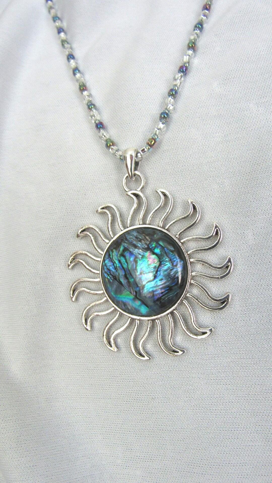 Abalone Shell Sun Pendant on Shiny Silver Iridescent Multi Color Beaded ...