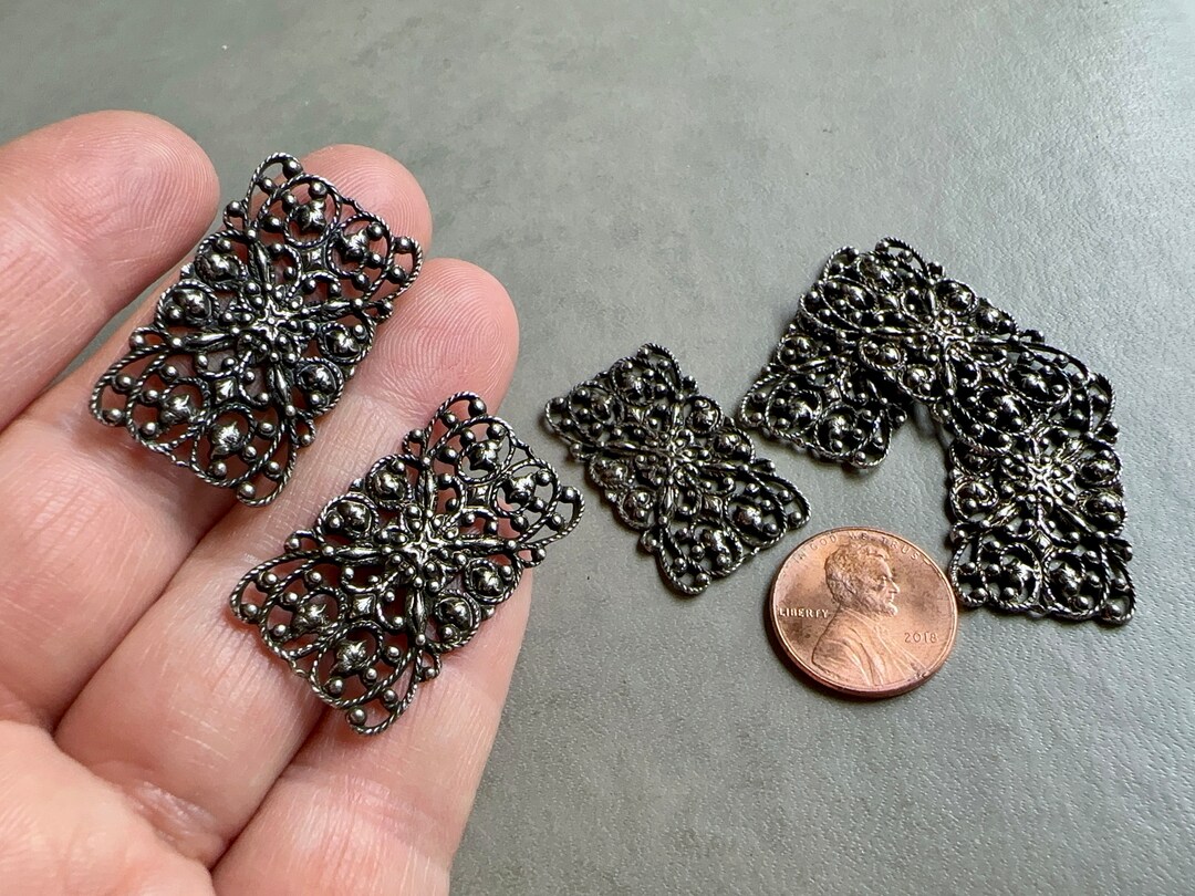 Very Intricate Filigree With Textured Loops and Swirls...upon Very ...