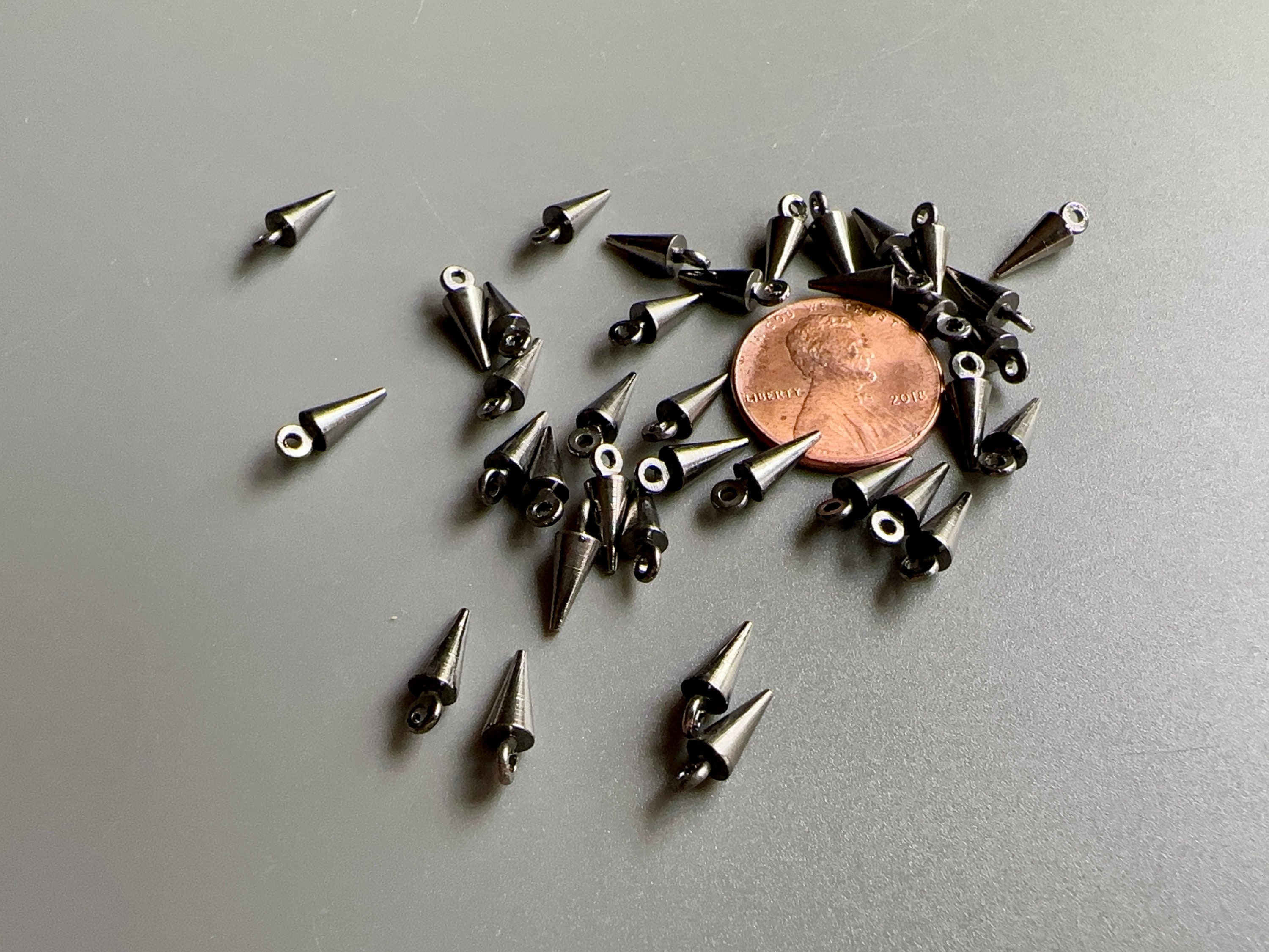 These Little Pointy Pendulums Pack a Lot of Style in Something - Etsy