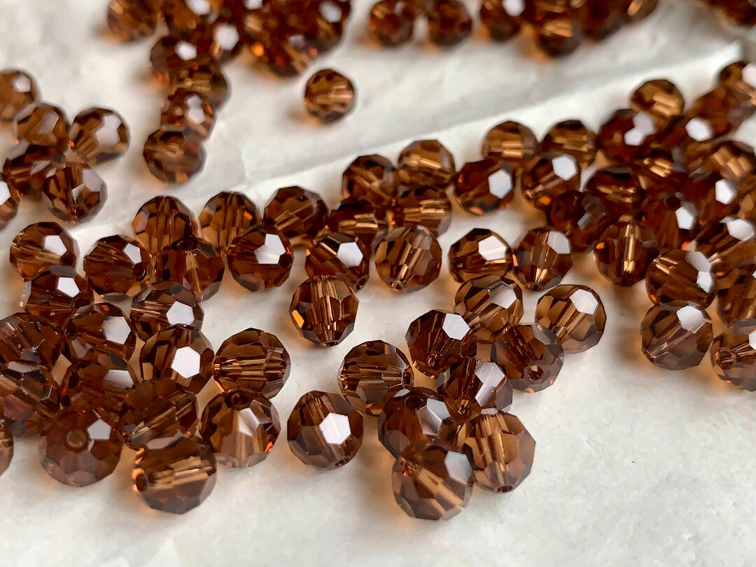 Gorgeous, Brand New in the Tissue Pack! Smoked Topaz Swarovski Rounds ...