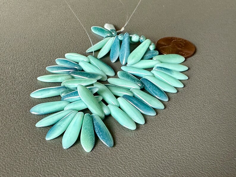 Lovely Color in These Czech Glass Daggers These GLOW Under a - Etsy