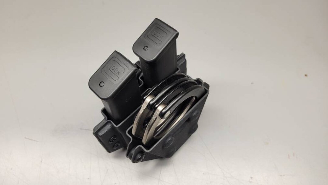45/10 ASP Hinged Cuff Holder and Universal OWB Double Magazine Carrier ...