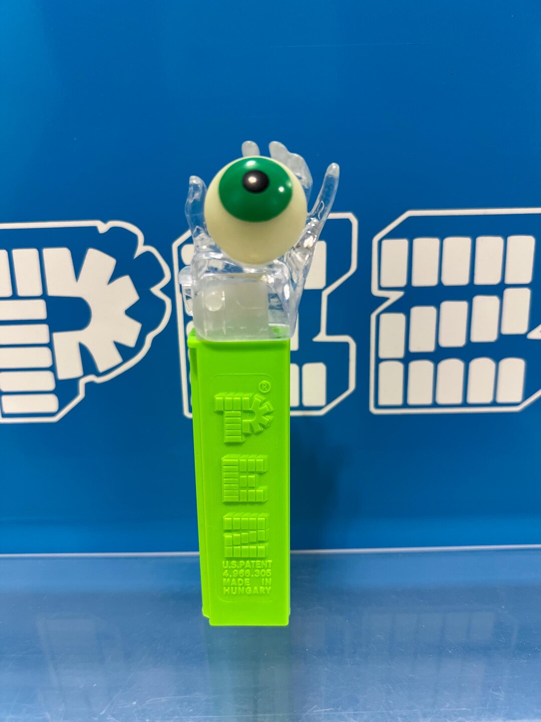 Vintage Crystal Clear Psychedelic Hand With Eye Neon Green Stem PEZ ...