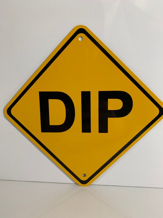 Yellow Triangle Street Sign