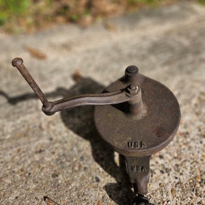 Hand crank sharpening stone store