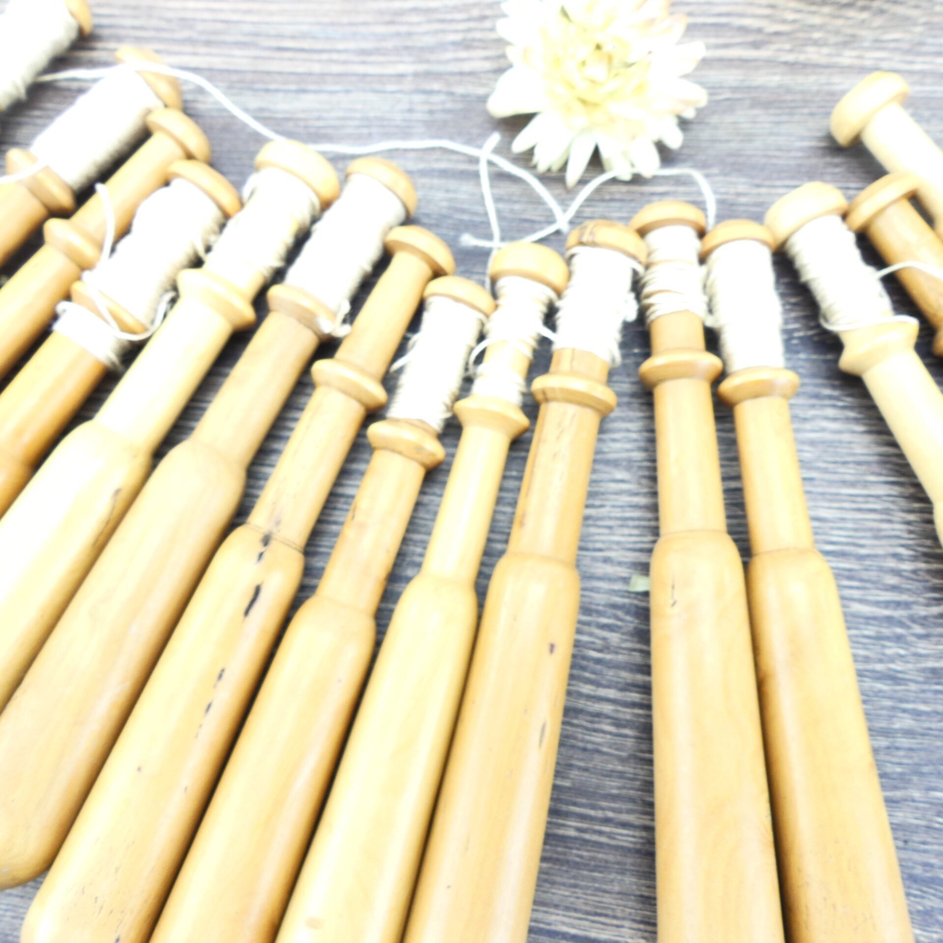 Ancient lace spindles, coils of old lace wood wire