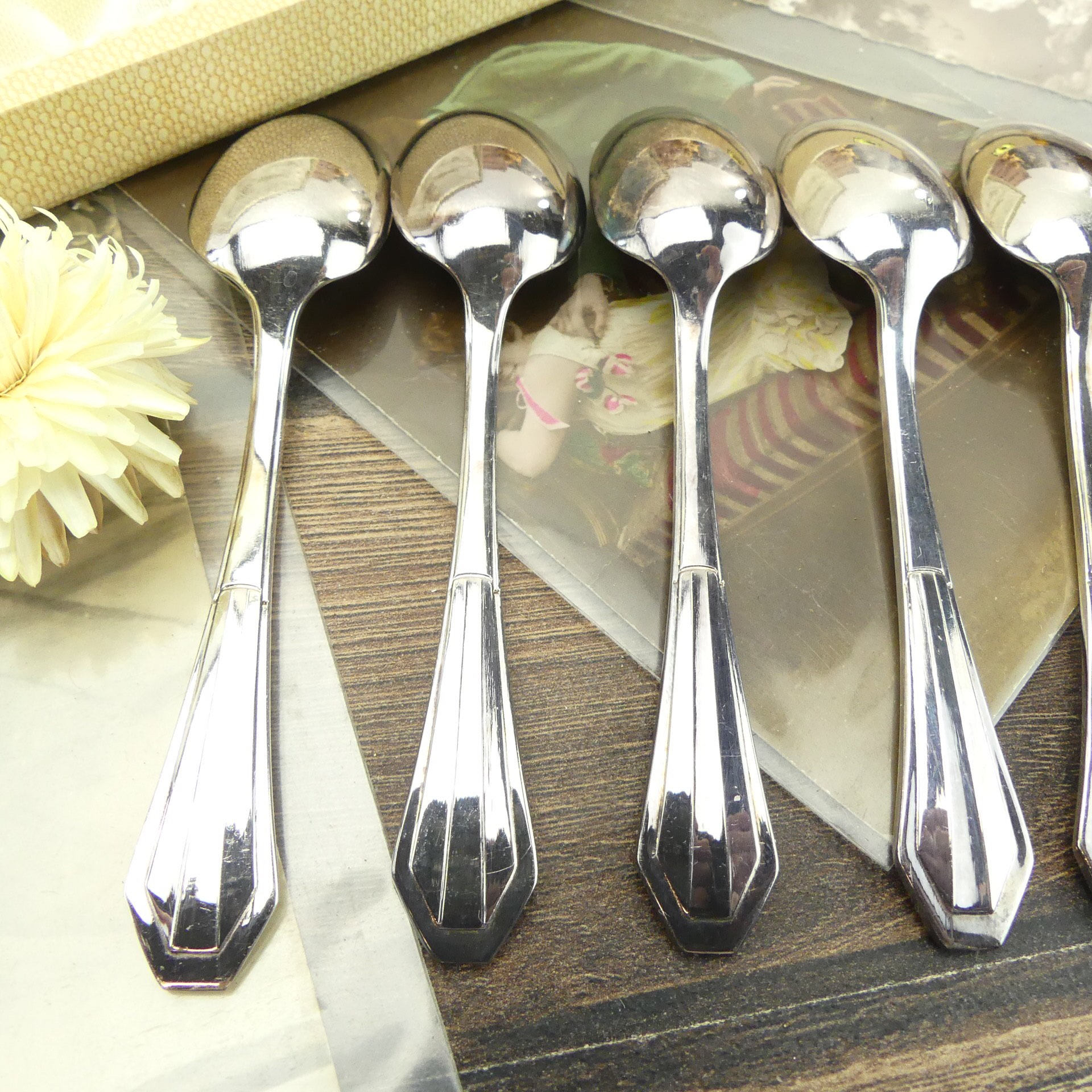 Old silver metal spoons, vintage dessert spoons, box of old spoons