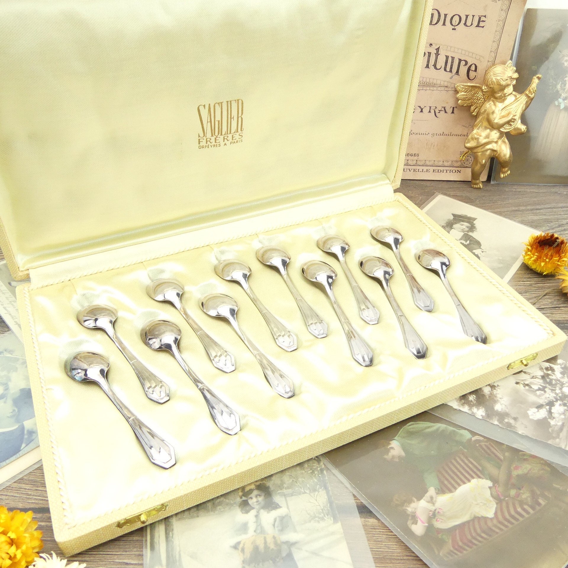 Old silver metal spoons, vintage dessert spoons, box of old spoons