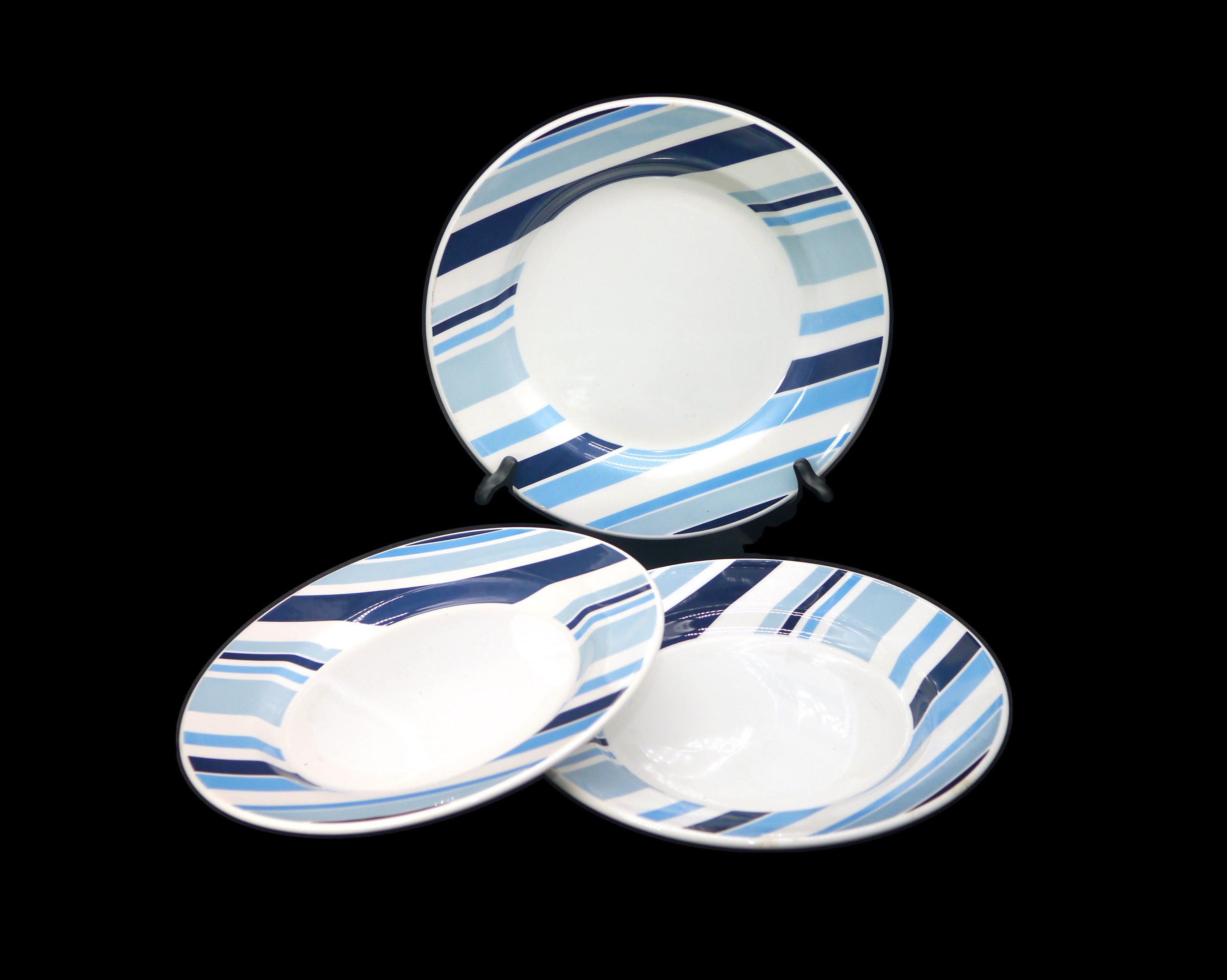 Set of Pier 1 Marea dinner plates made in Italy. Blue stripes on white ...