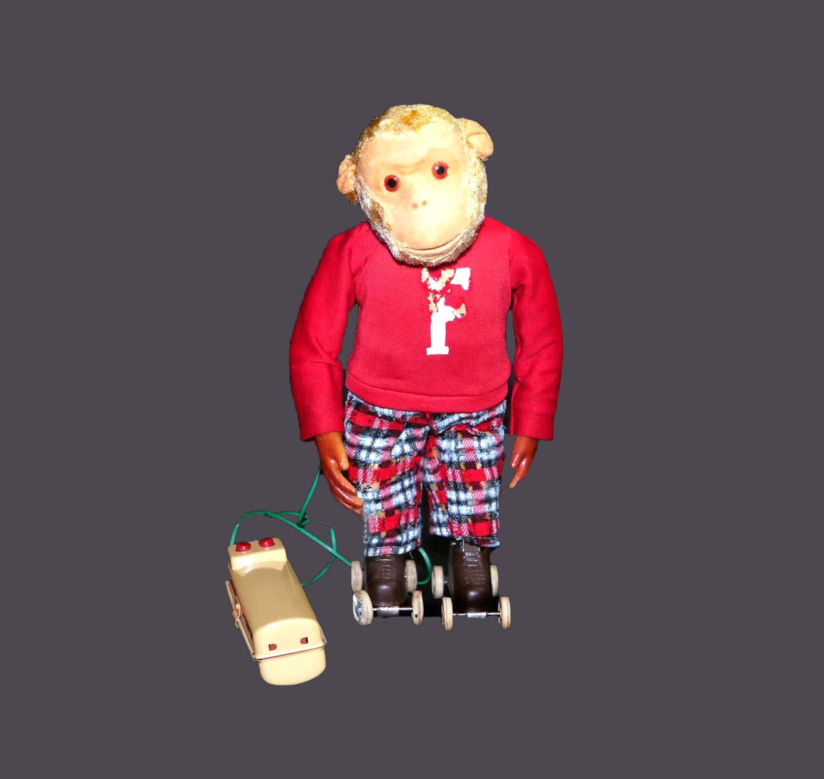 Mid-century Frankie the Roller-Skating Monkey. Remote-controlled tin ...