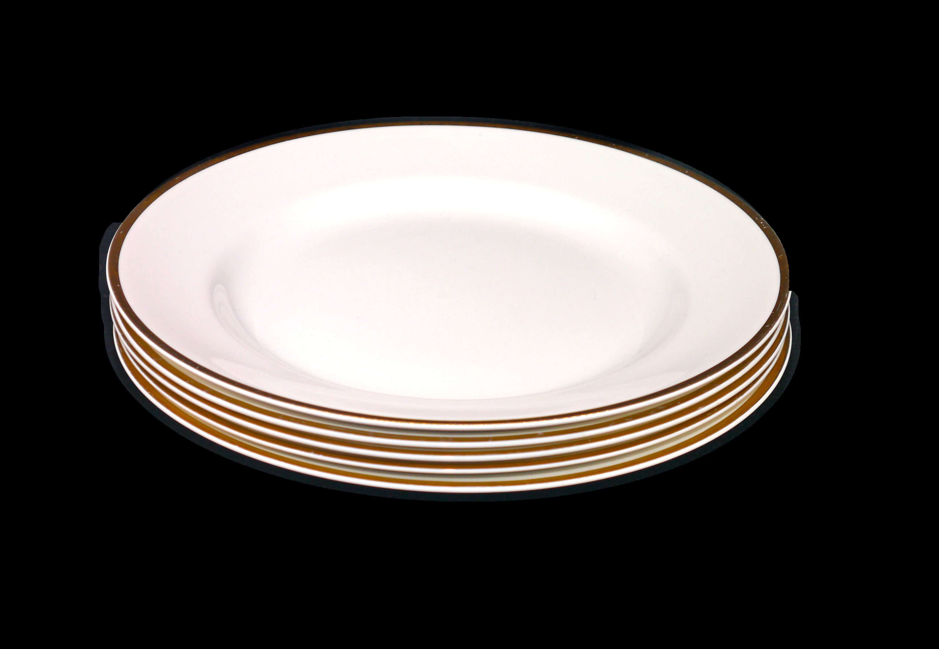 Five almost antique Johnson Brothers JB570 dinner plates made in England.