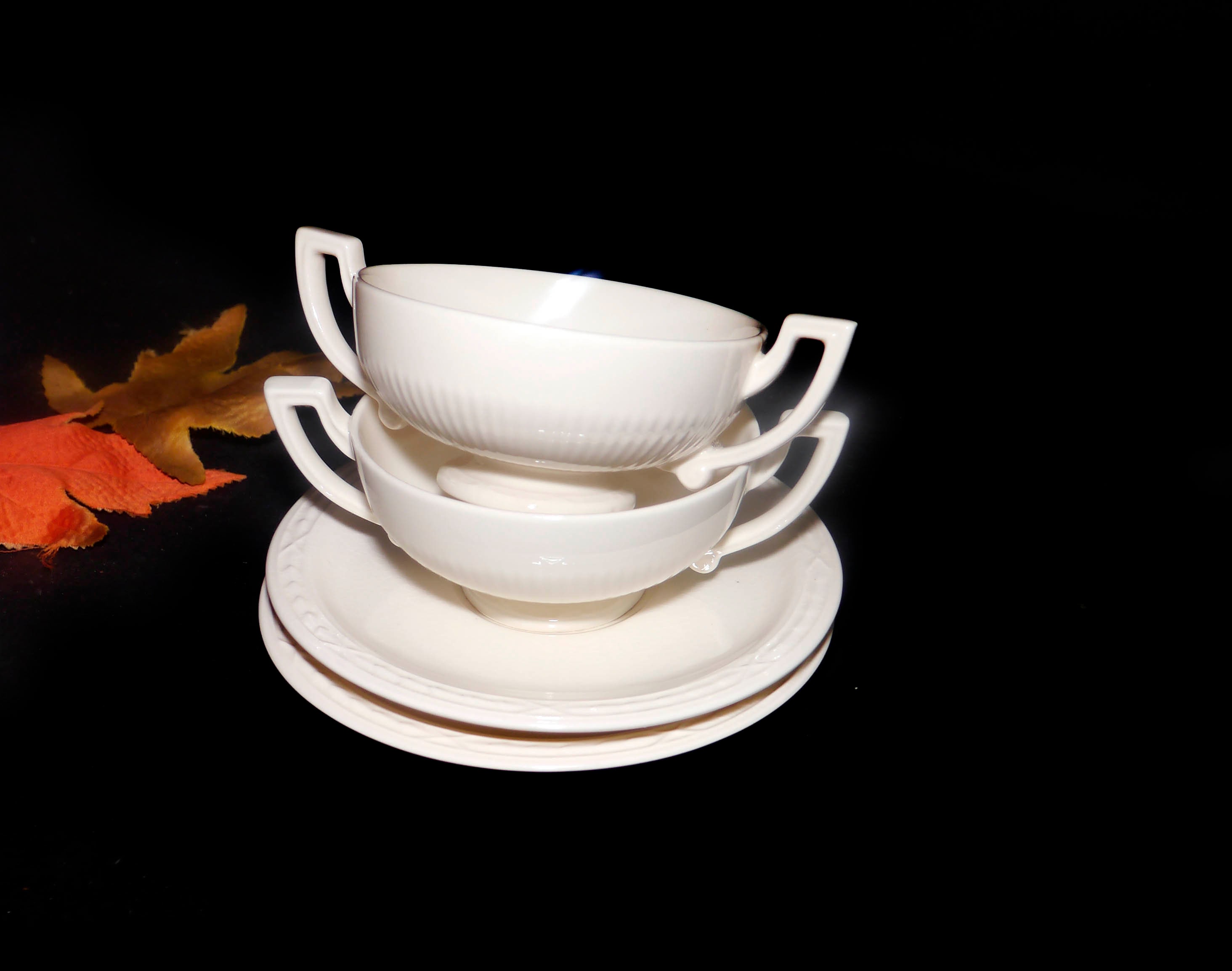 Pair of Royal Creamware Recamier double-handled cream soup sets.