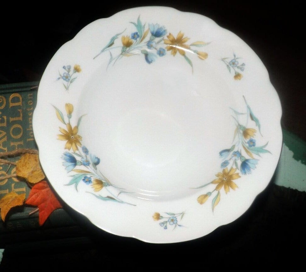 Vintage (1970s) Cmielow rimmed soup bowl. Blue, yellow flowers made in ...
