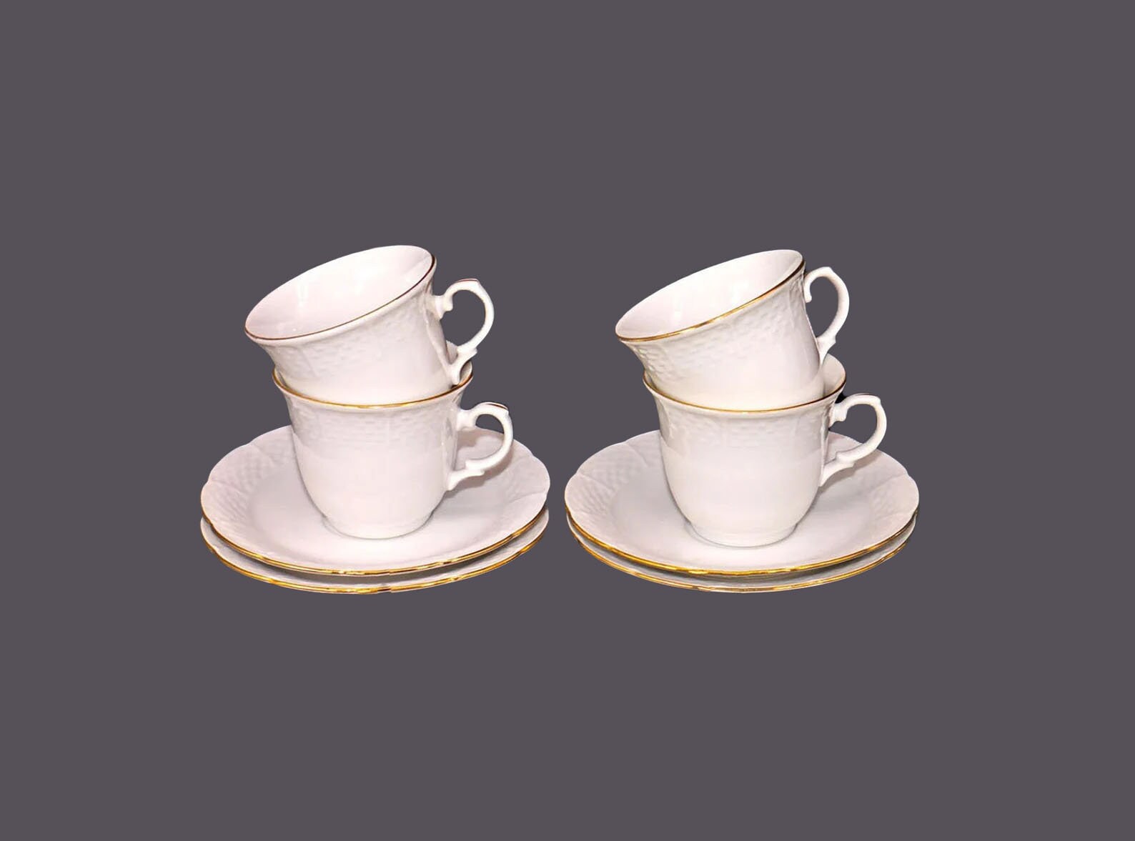 Four Thun THU407 cup and saucer sets made in Czechoslovakia.