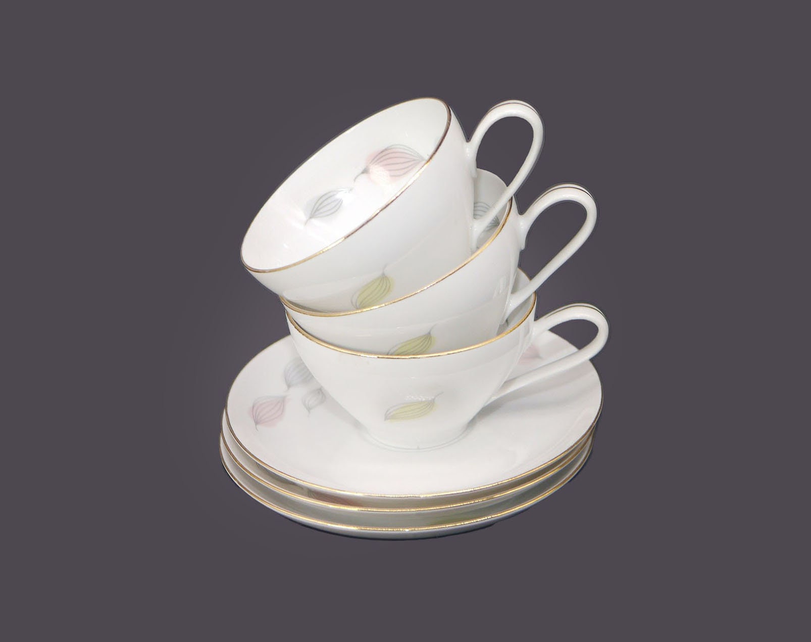 Three Thomas Germany 2002 wide-mouth cup and saucer sets.