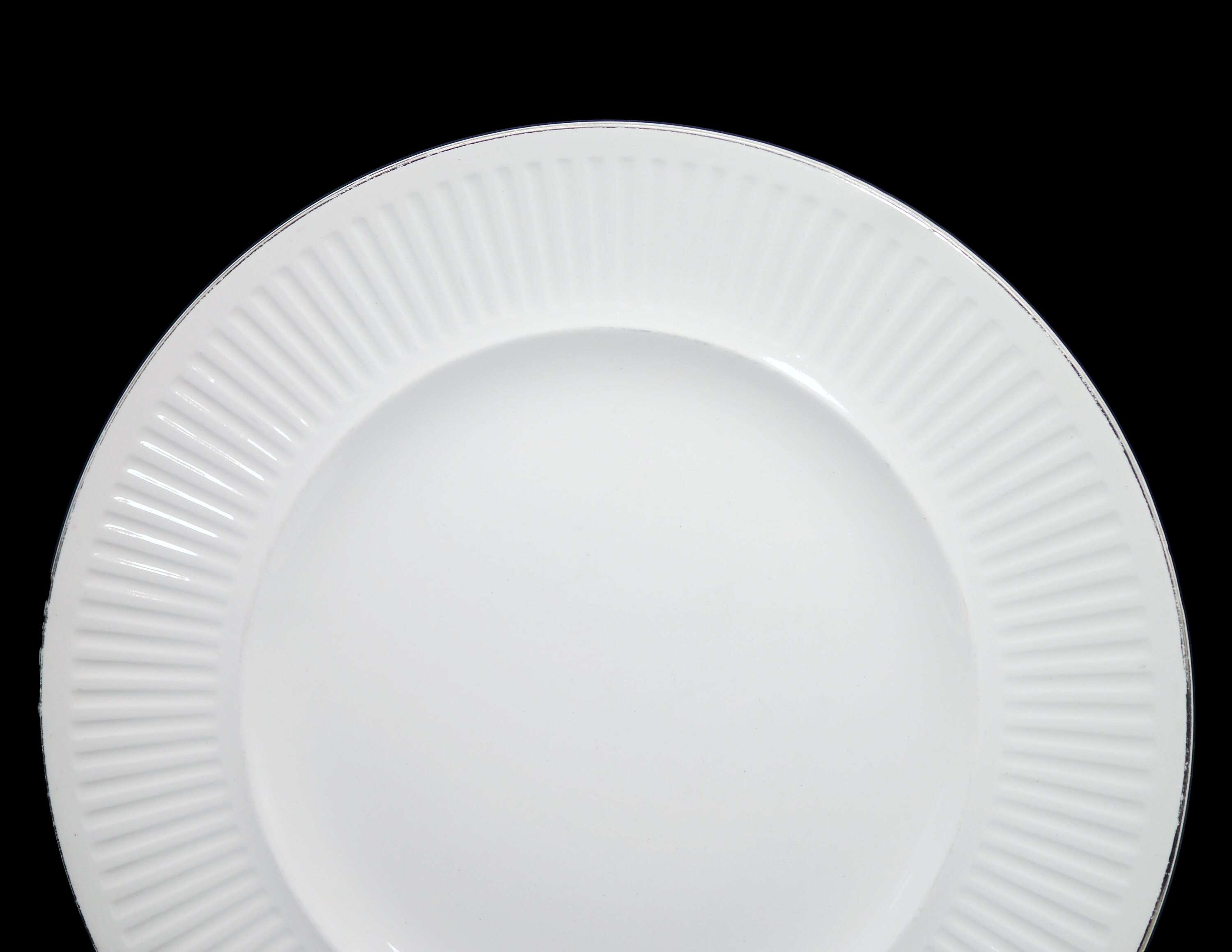 Four Sovereign Potters A216-67 all-white dinner plates.