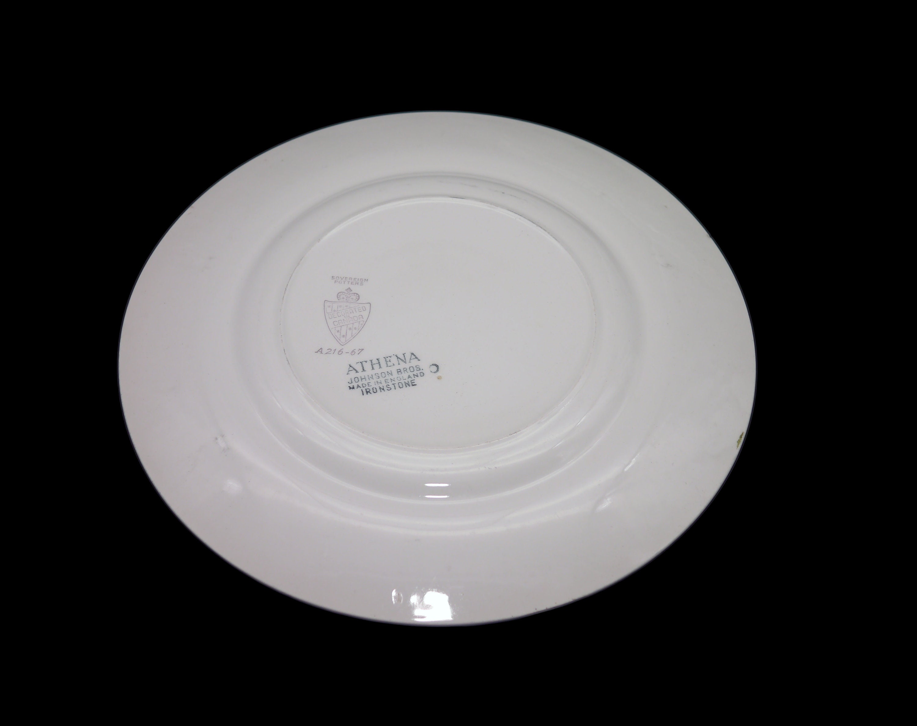 Four Sovereign Potters A216-67 all-white dinner plates.