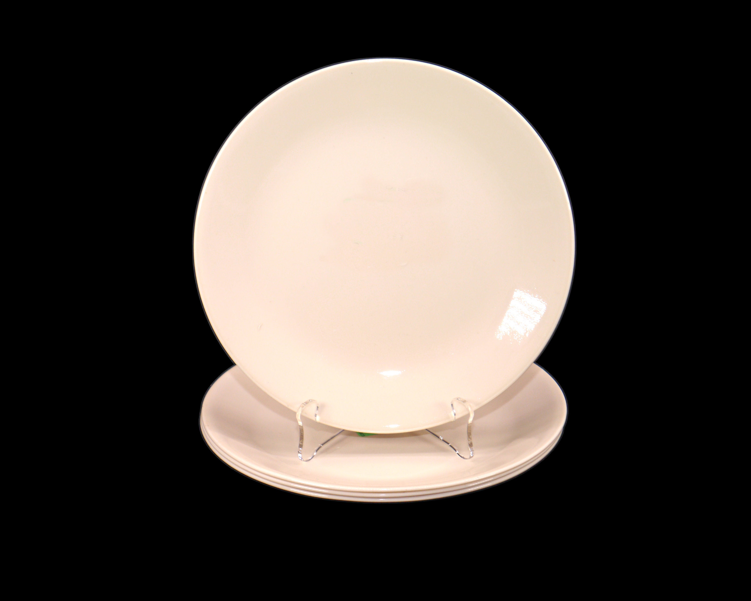 Four Corelle Corningware Sandstone all-ivory salad plates made in USA.