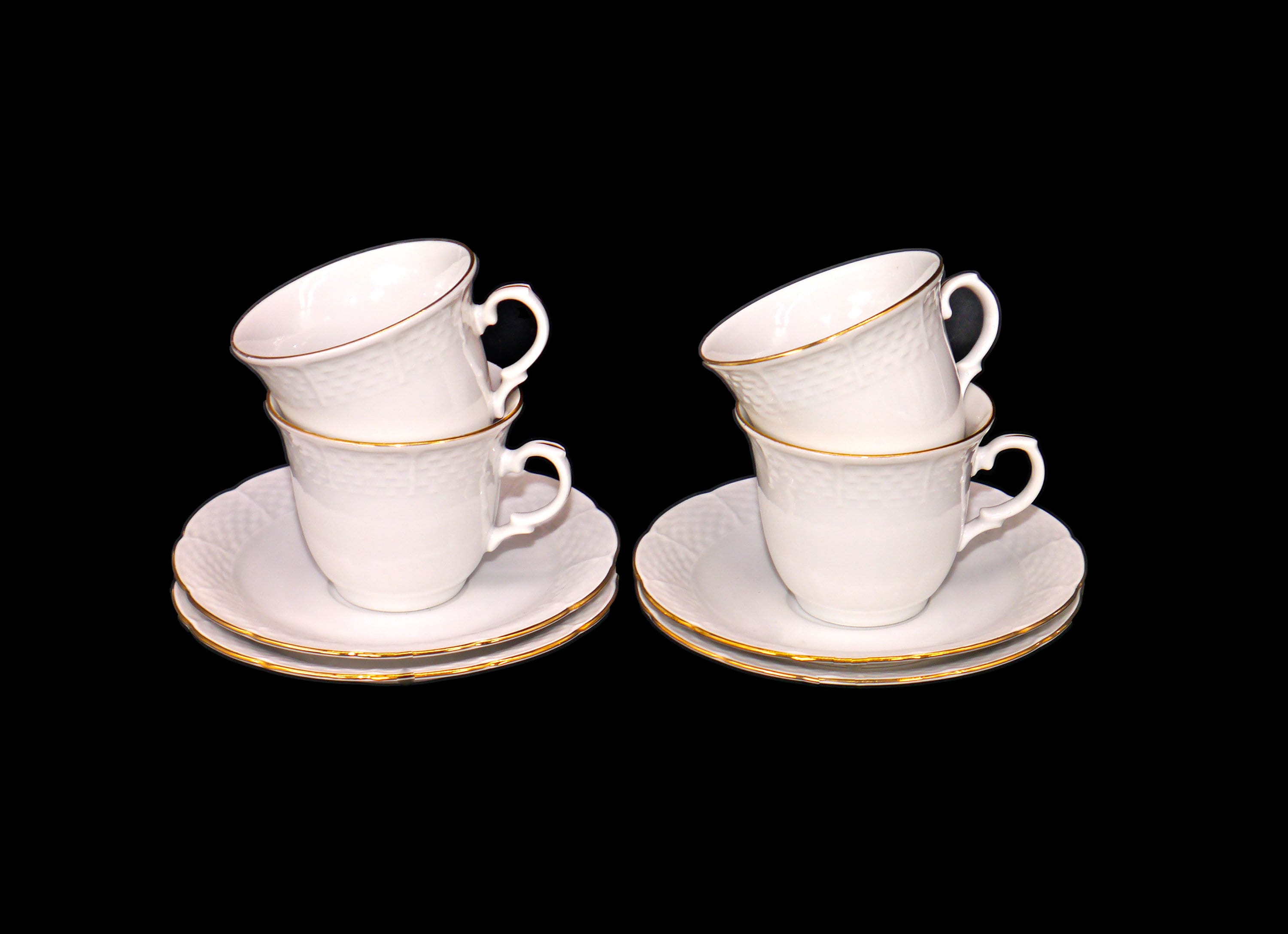 Four Thun THU407 cup and saucer sets made in Czechoslovakia.