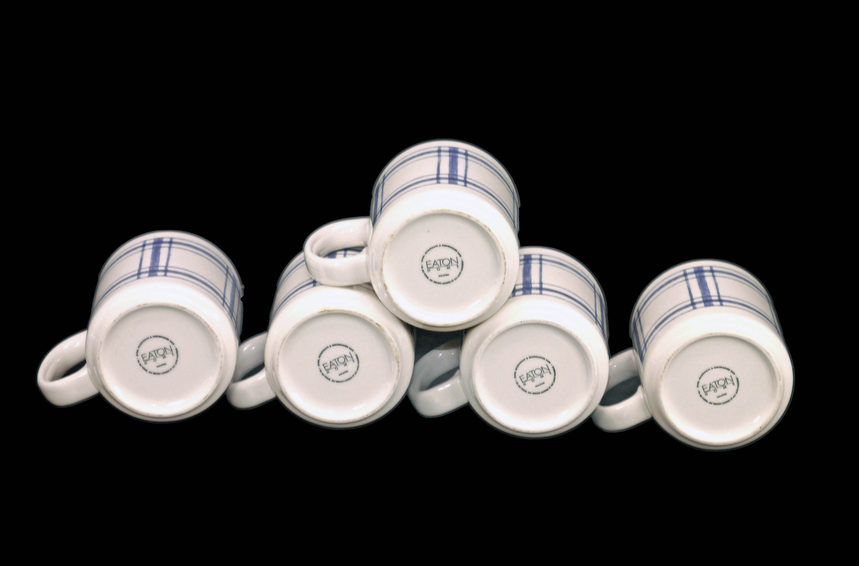 Five Eaton Home ceramic coffee or tea mugs. Blue-and-white checks.