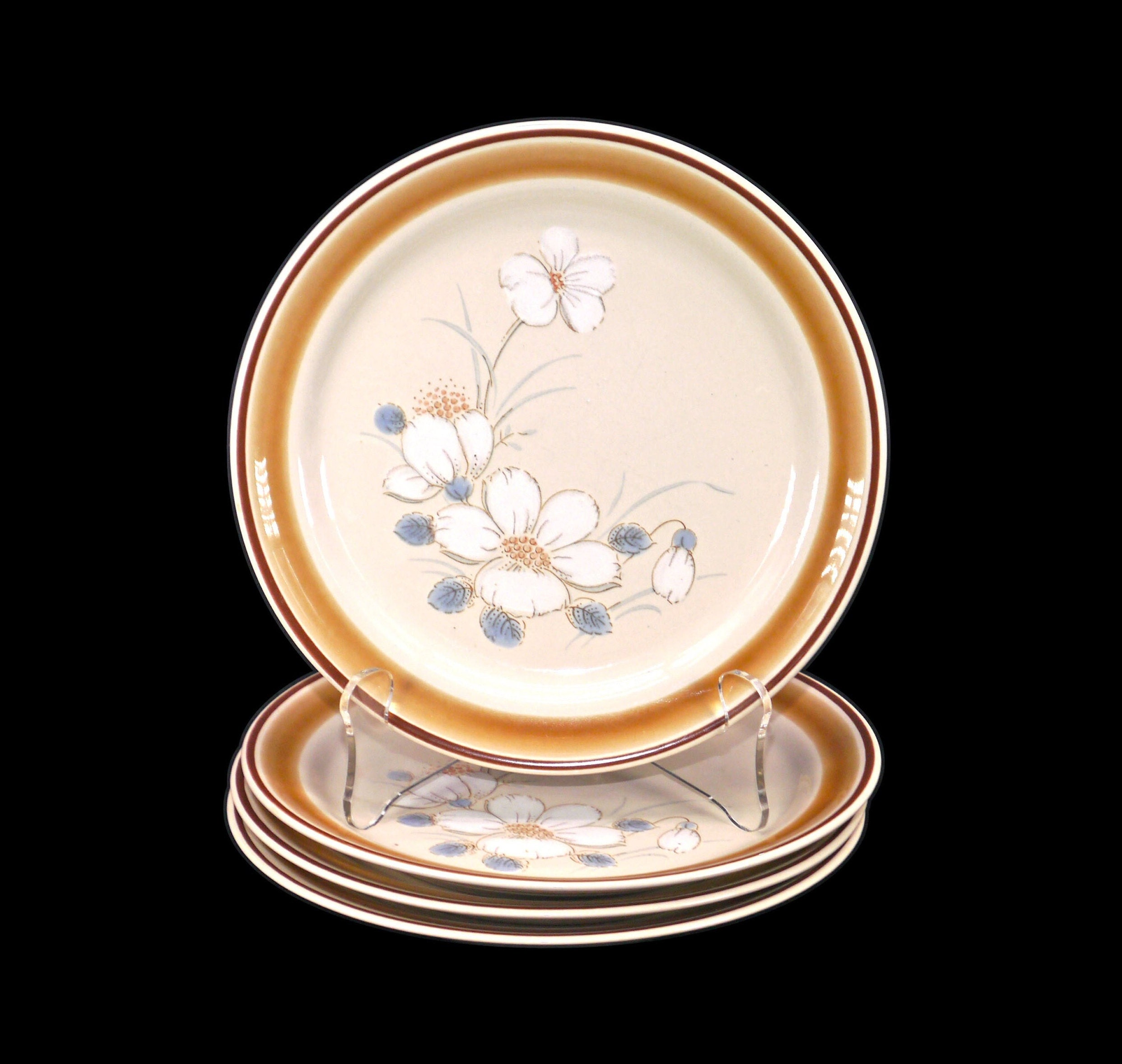 Four Hearthside Water Colors Dawn stoneware salad plates made in Japan.