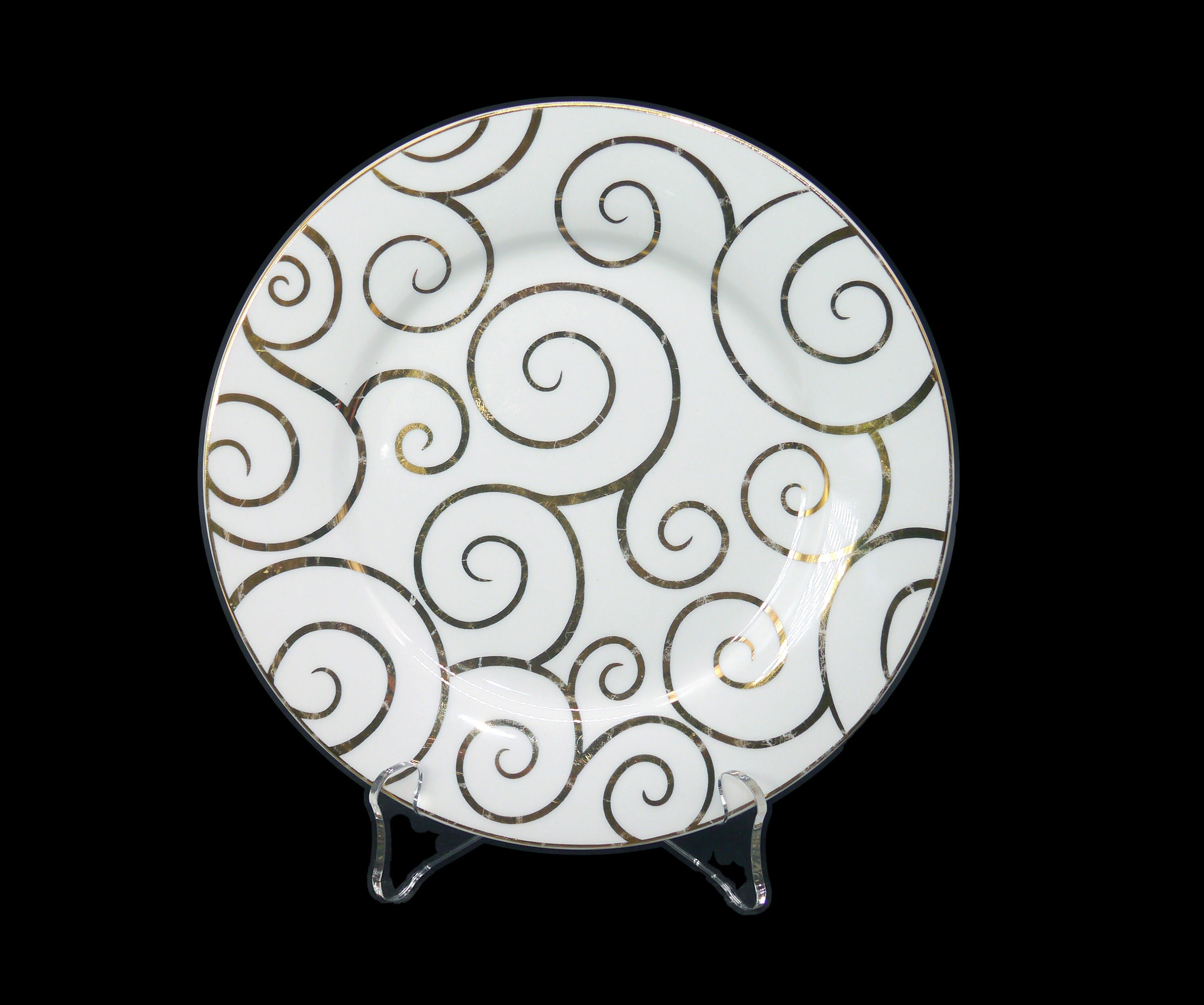 Pier 1 Gold Swirl Christmas trio of cup and saucer set and one salad plate.
