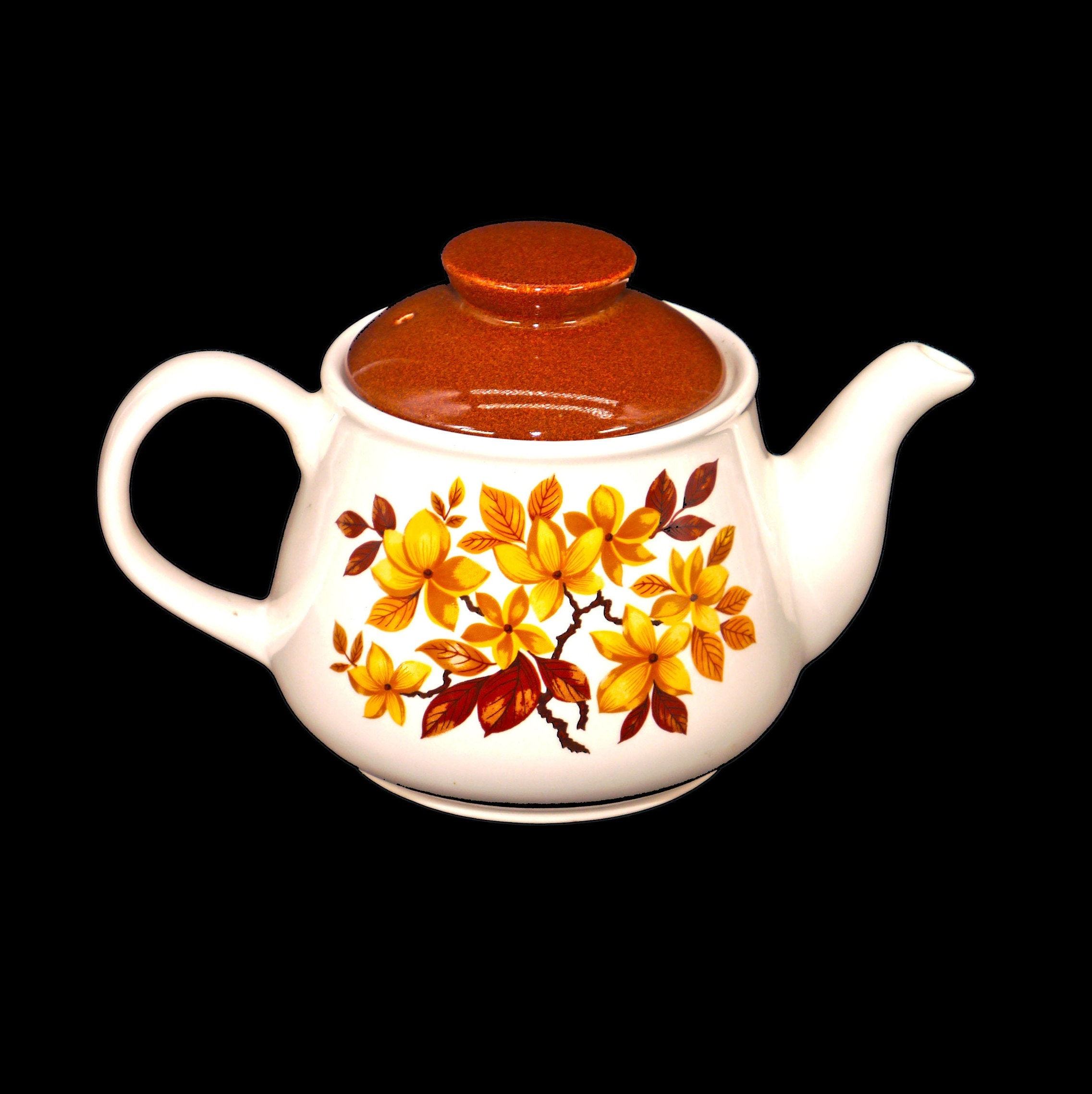 Sadler four-cup teapot. Fall | autumn-colored leaves, brown lid. Made ...