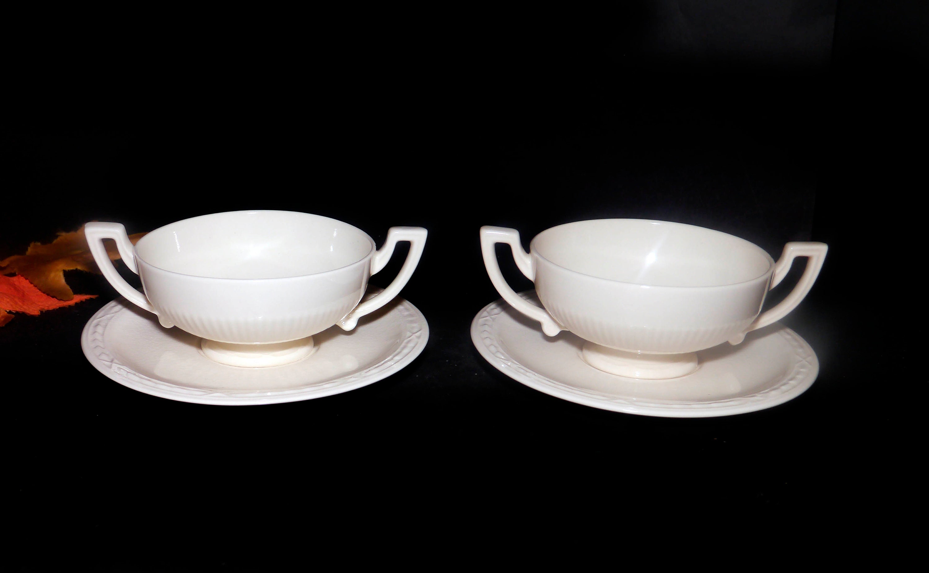 Pair of Royal Creamware Recamier double-handled cream soup sets.