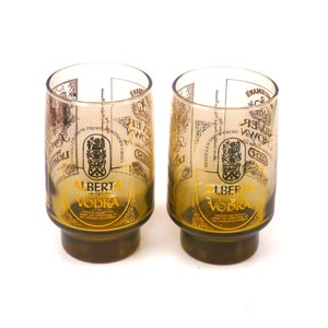 Pair of Amber Glass Cocktail Glasses. Etched-glass Branding. Silver ...