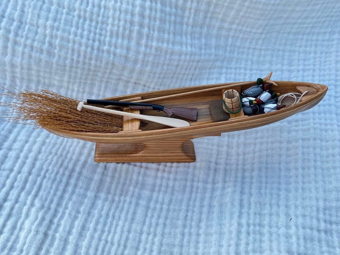 Cypress Dugout Canoe With Shotgun, Duck Decoys, Paddle, and Push Pole ...